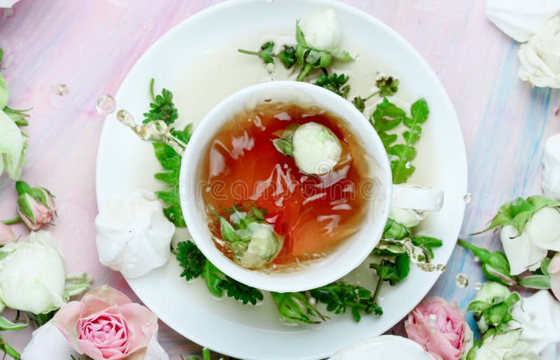 White Cup of Spring Tea with Rose Petals Stock Image - Image of ...