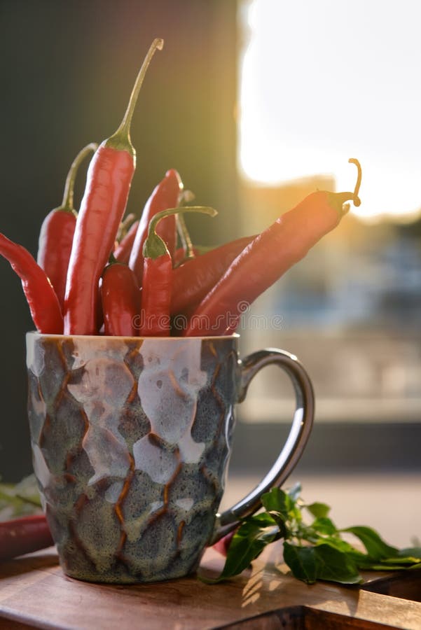 Cup with Fresh Chili Peppers on Wooden Board Stock Image - Image of ...