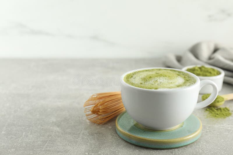 Cup of Fresh Matcha Latte on Light Grey Table. Space for Text Stock ...