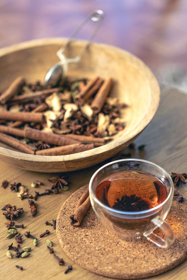 Cup of Freshly Brewed Black Tea, Different Types of Spices on Wooden ...