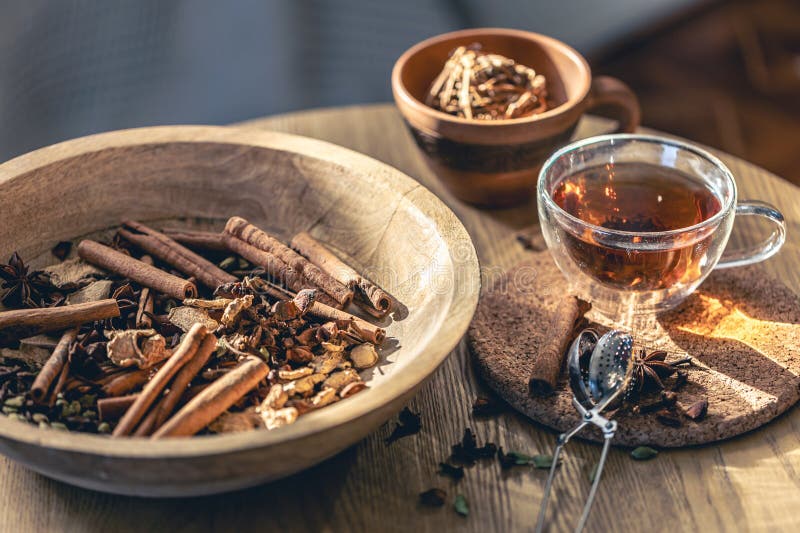 Cup of Freshly Brewed Black Tea, Different Types of Spices on Wooden ...