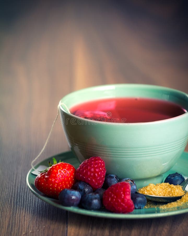 Cup of Fruit Tea with Strawberries, Raspberries an Stock Photo - Image ...