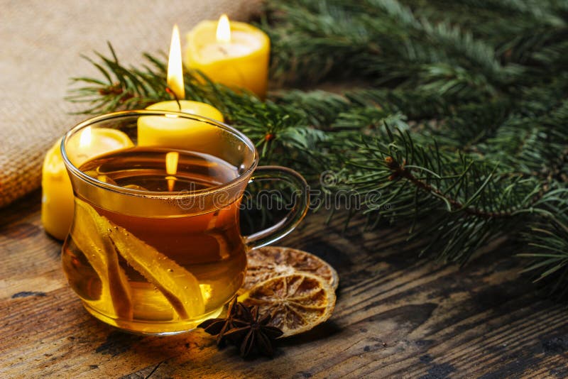 Cup of Golden Tea in Evening Candle Light. Stock Image - Image of ...