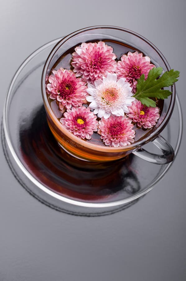 Cup of Herbal Tea with Flowers on Black Stock Image - Image of calm ...