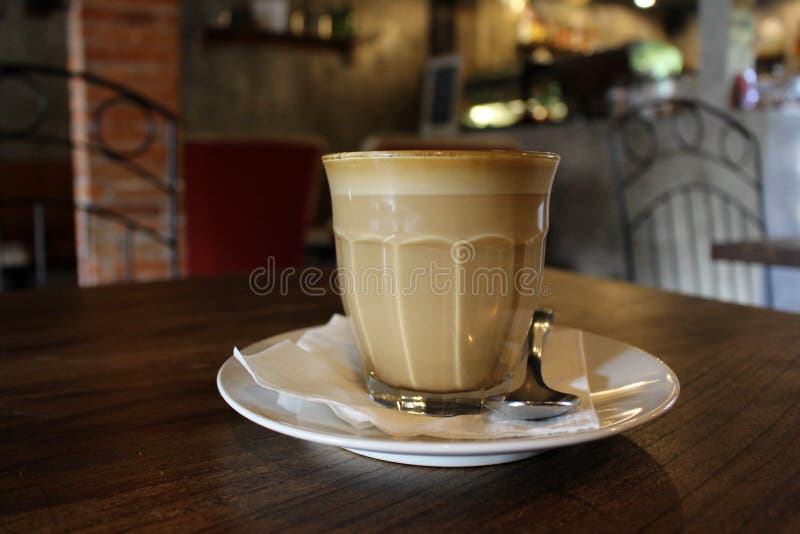 A Cup of Hot Cafe Latte Plus Its Latte Art Stock Photo - Image of ...