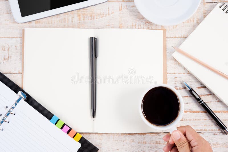 Cup of Hot Coffee and Diary on Wood Table Background Stock Image ...