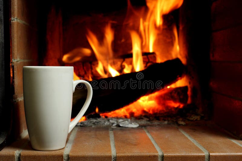 A Cup of Hot Coffee by Fireplace Stock Photo - Image of relaxation ...