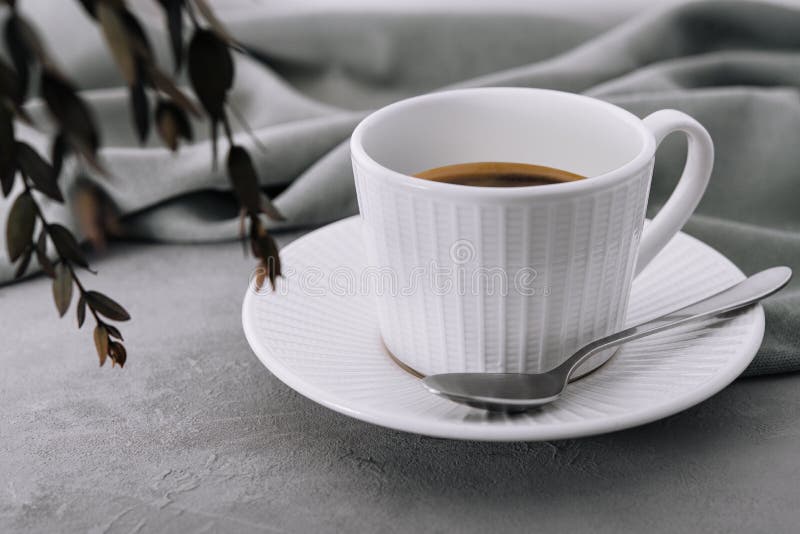 Cup of hot coffee on plate stock image. Image of rest - 268721769