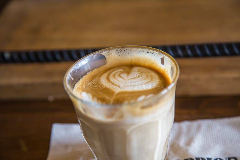 Cup of hot latte coffee stock image. Image of wooden - 51991103