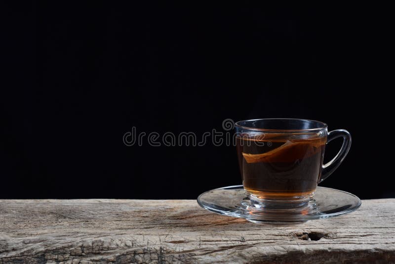 Cup of Hot Tea with on a Black Background. Stock Image - Image of ...