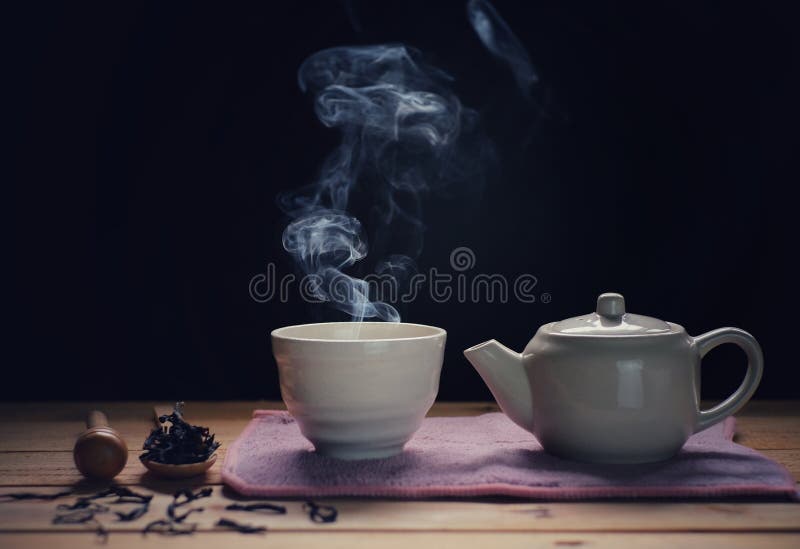 Cup of tea with blue smoke stock photo. Image of food - 21589928