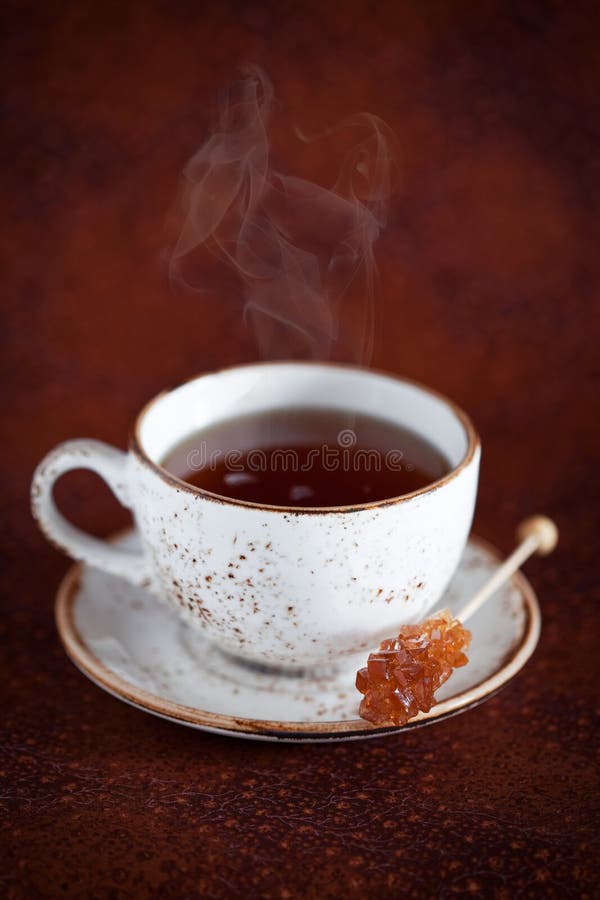 Cup of hot tea stock photo. Image of stick, heat, rock - 35486670