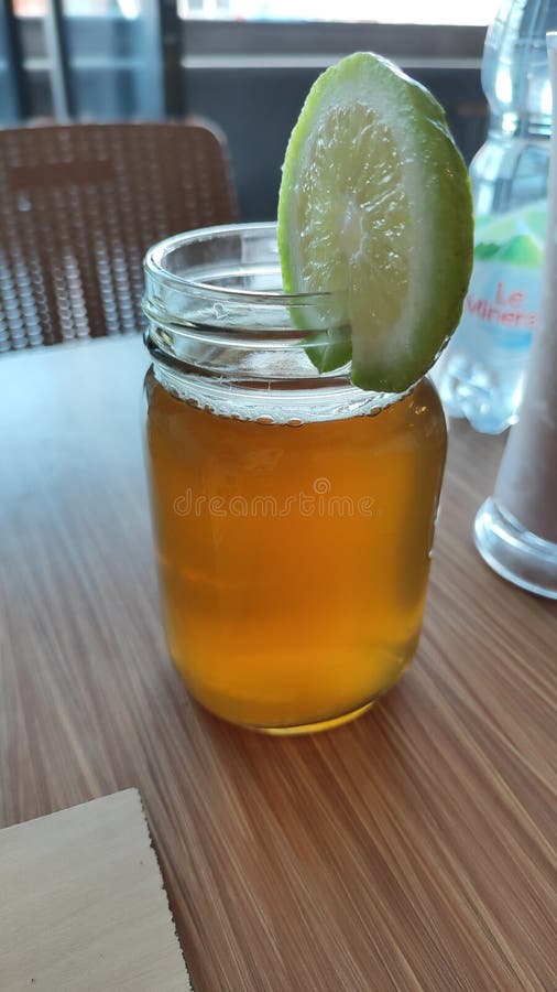 A Cup of Ice Lemon Tea with a Big Slice Stock Photo - Image of meal ...