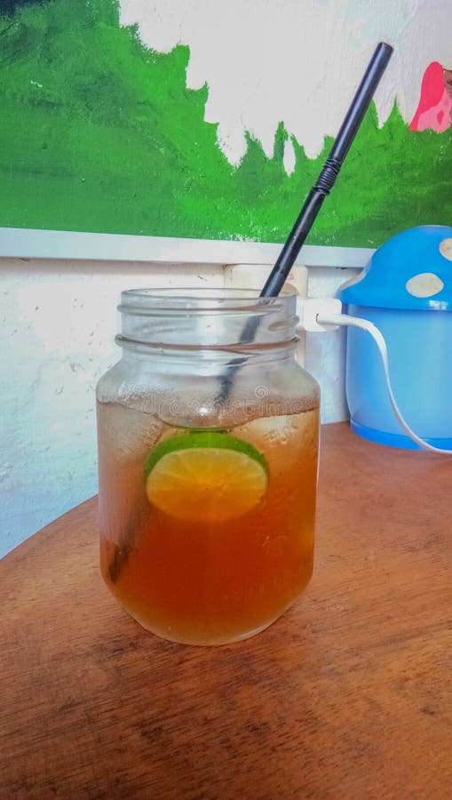 A cup of iced lemon tea stock image. Image of juice - 211665835