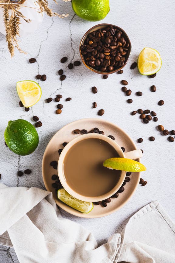 A Cup of Latte Infused with Lime on the Table Top and Vertical View ...