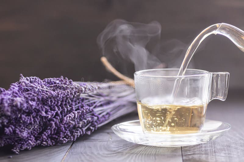 Cup of Lavender Tea with Dried Lavender Flowers on Rustic Table, Herbal ...