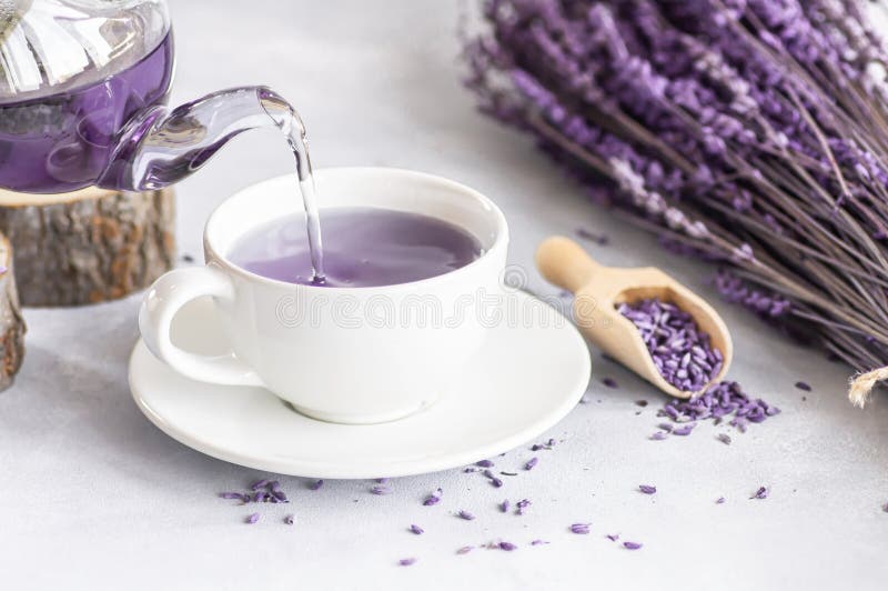 Cup of Lavender Tea with Dried Lavender Flowers on Rustic Table, Herbal ...