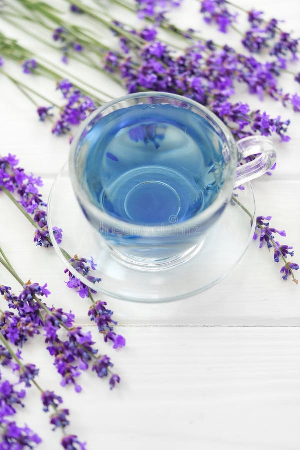Cup with Lavender Tea and Lavender Flowers on Wooden Backgorund. Stock ...