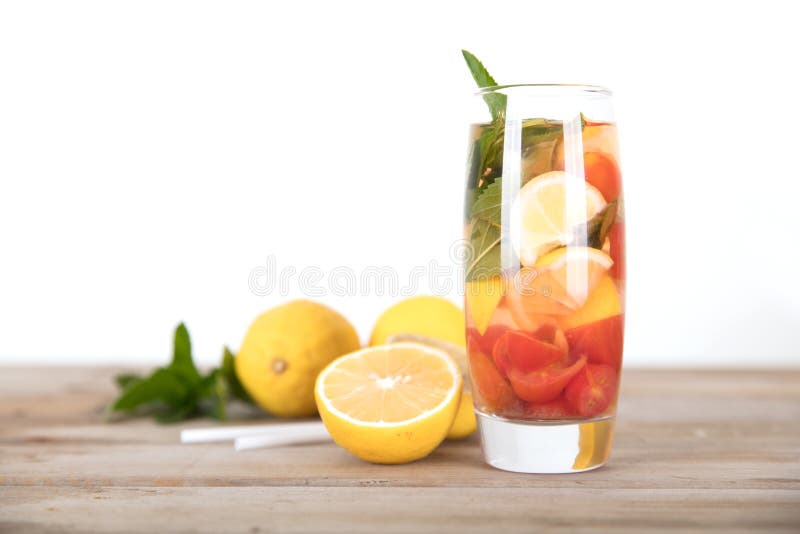 A Cup of Lemon Mixed Fruit Mint Tea and Fresh Lemon Fruit Stock Image ...