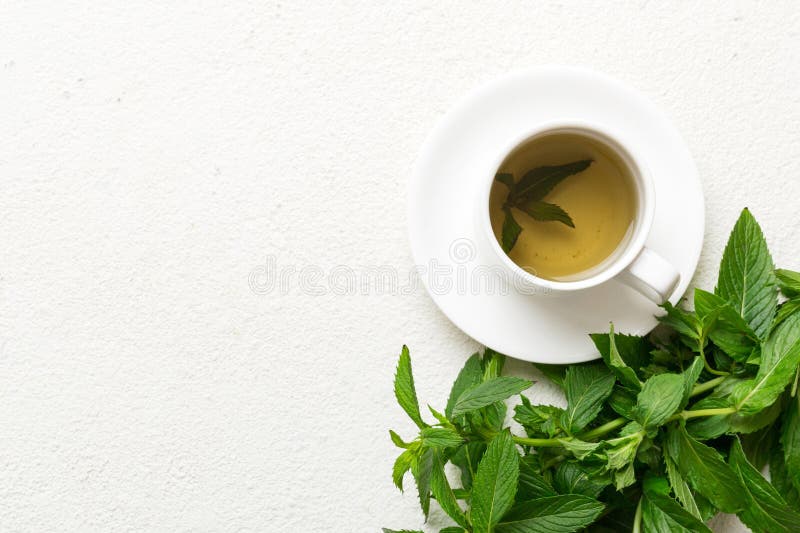 Cup of Mint Tea on Table Background. Green Tea with Fresh Mint Top View ...