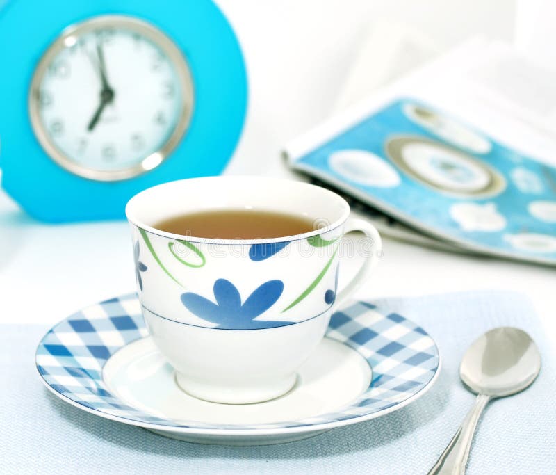 Cup of Morning Tea and Alarm Clock Stock Image - Image of glass, table ...