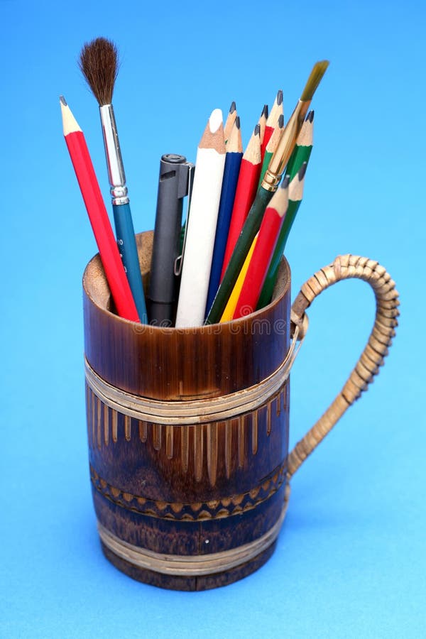 Cup with pens and pencils stock image. Image of black - 24723335
