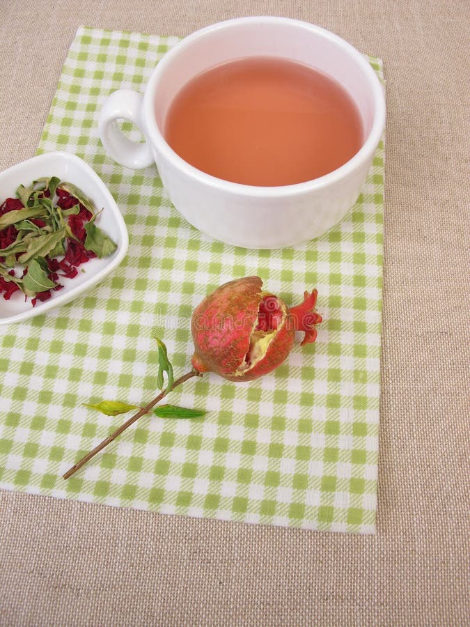 A cup of pomegranate tea stock photo. Image of dried - 155491008