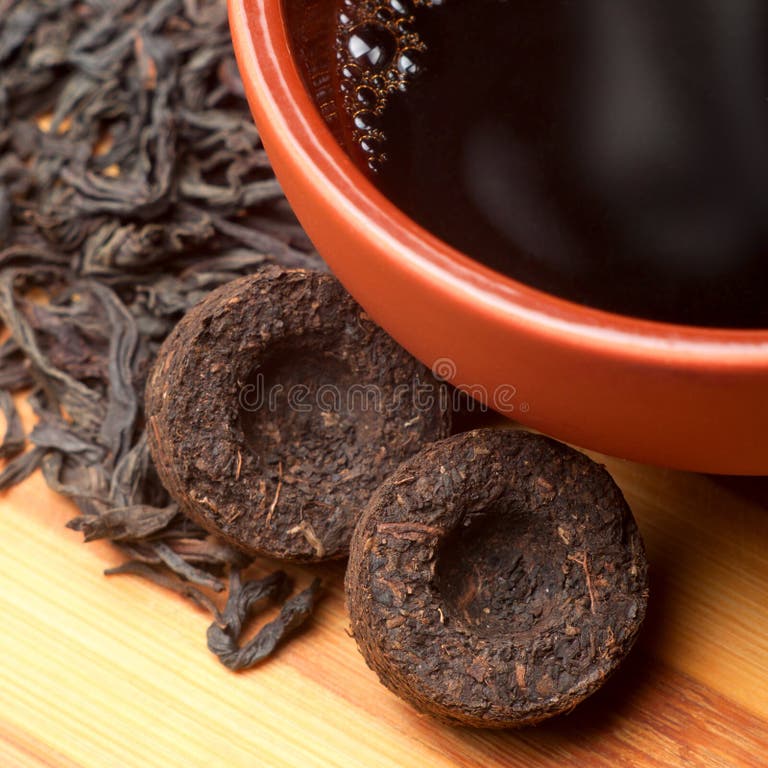 The Cup of Pu-erh and Two Bricks of Tea Stock Photo - Image of bowl ...