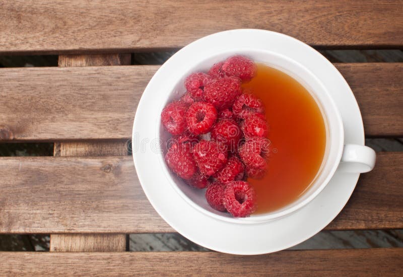 Cup with raspberry stock image. Image of pleasure, drink - 24614103