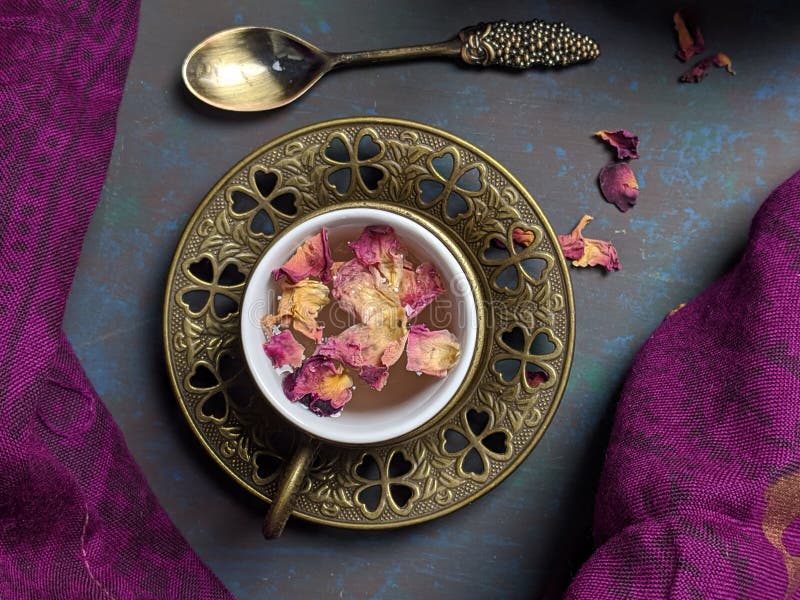 A Cup of Rose Tea with a Metal Tea Pot Stock Image - Image of organic ...