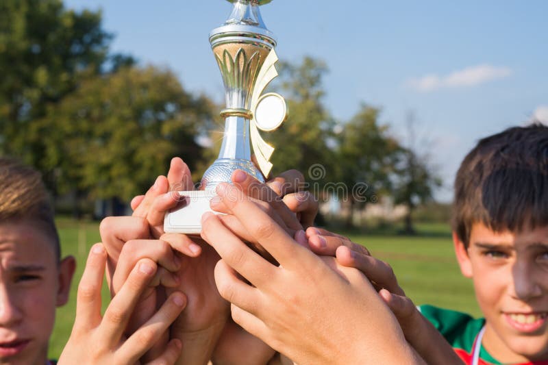 Sport Kids Lifting Trophy Stock Photos - Free & Royalty-Free Stock ...
