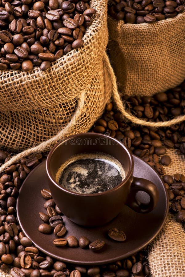 Cup of steaming coffee stock image. Image of group, dark - 119069849