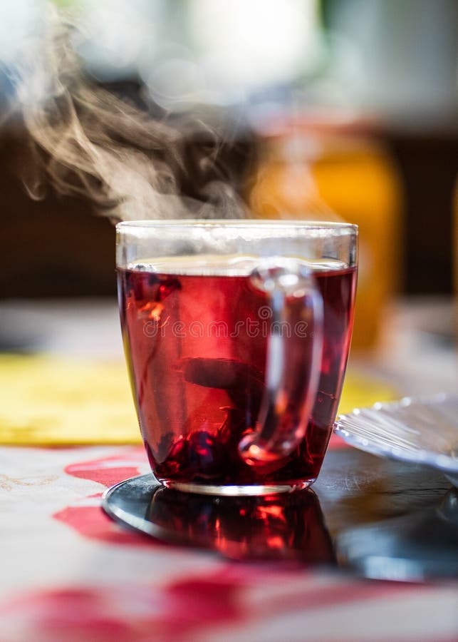 Cup of Steaming Hot Herbal Tea on Table in Daylight Stock Image - Image ...