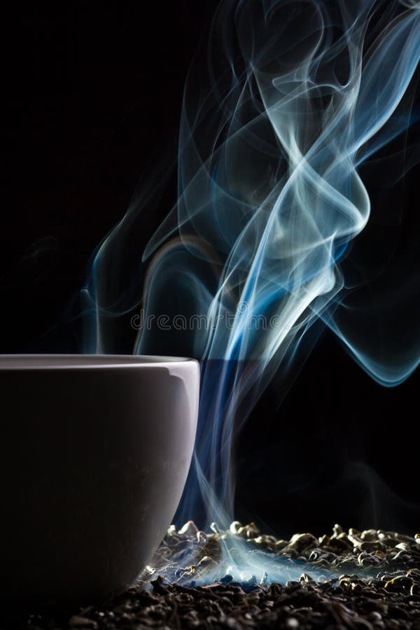 Cup of tea with blue smoke stock photo. Image of heat - 21589928