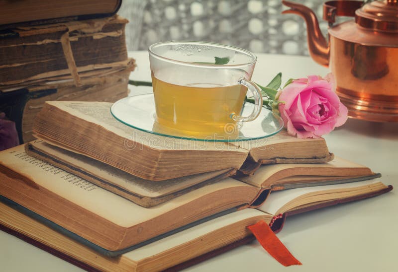 Cup of tea with books stock photo. Image of paper, roses - 70038532