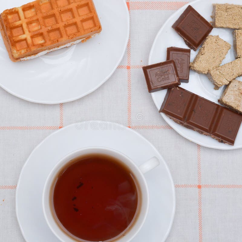 Cup of Tea and Chocolate with Nuts Editorial Photo - Image of dessert ...