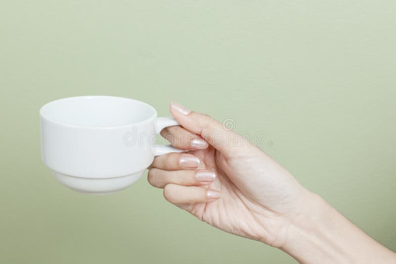 Cup of Tea or Coffee in Hand Stock Image - Image of waiter, slake: 36215087