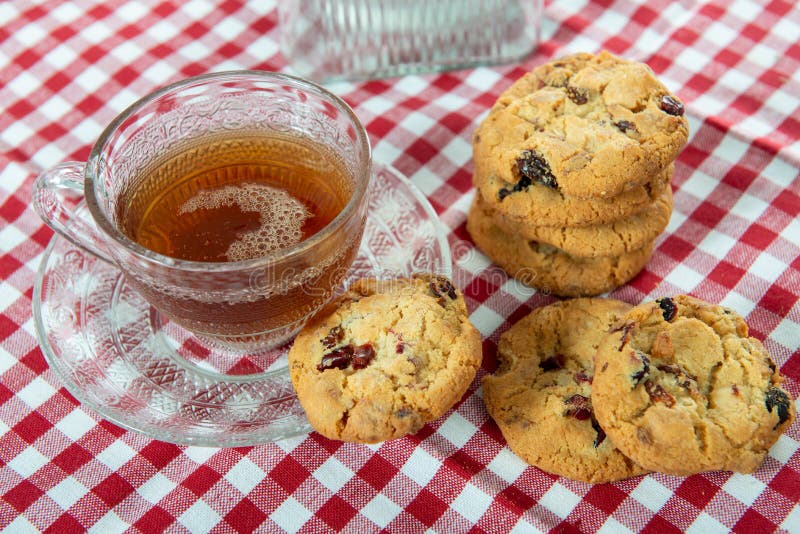 Cup of Tea with Cookies on Checkered Napkin Red and White Stock Image ...