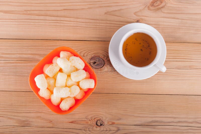 Cup of tea and corn flakes stock image. Image of wood - 70831843
