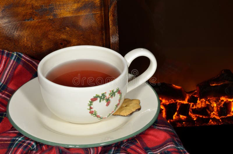 A Cup of Tea by the Fireplace Stock Image - Image of love, fireplace ...