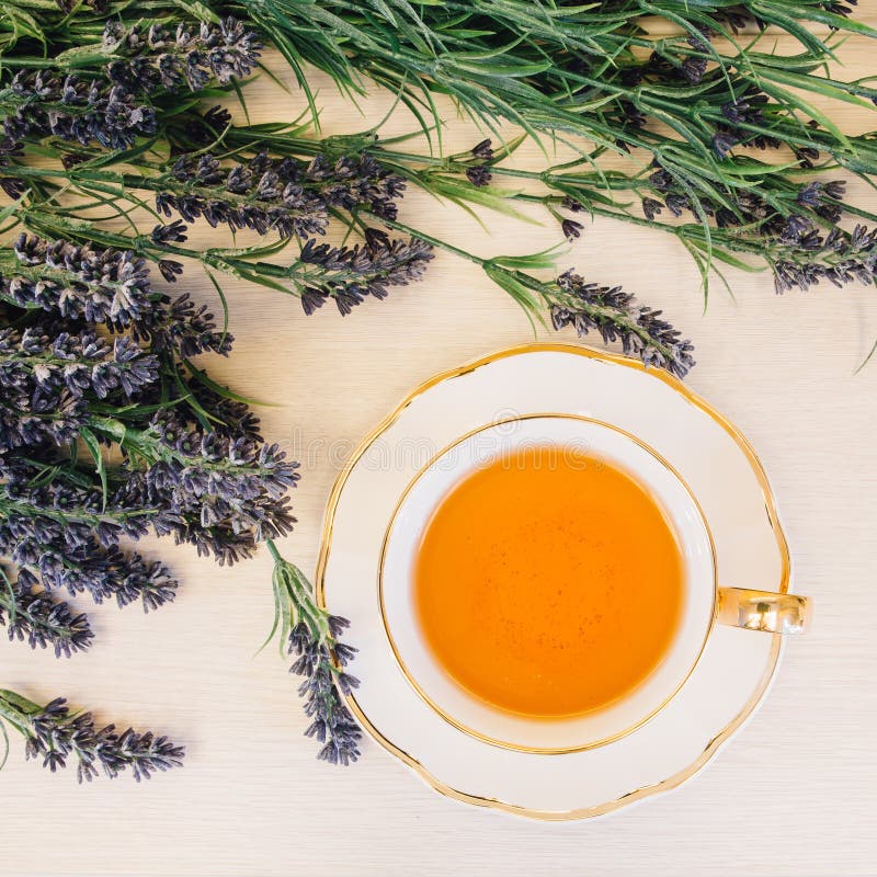 Cup of Tea with Flower on a Wooden Background Top View Stock Image ...