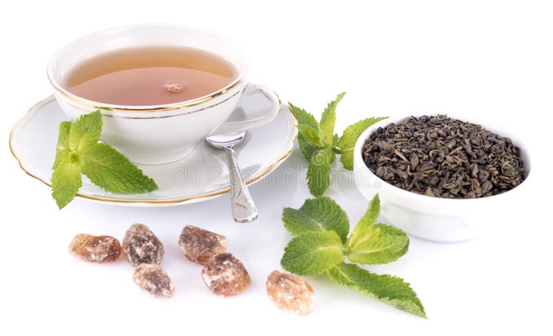 Cup of Tea with Green Dry Tea and Crystal Sugar Stock Photo - Image of ...
