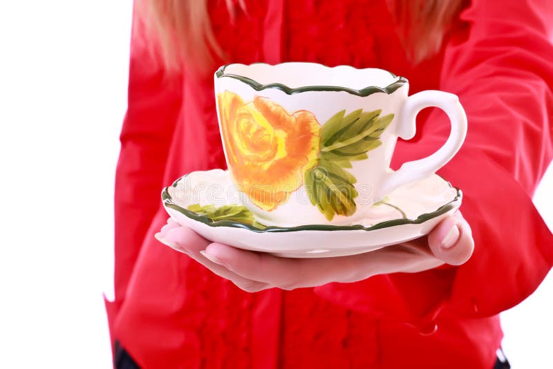 A cup of tea on hand stock photo. Image of hand, hold - 10600944