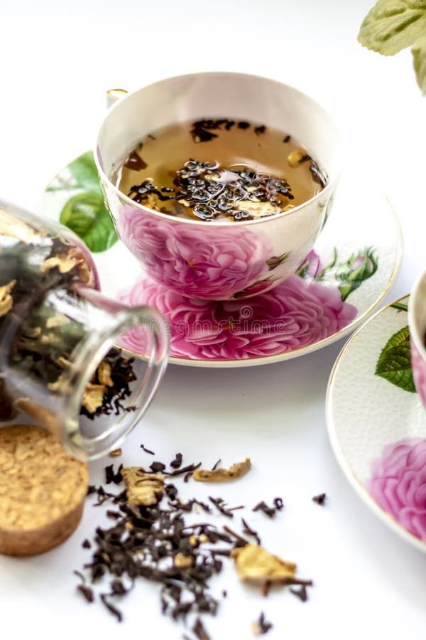 Cup of Tea. Large Tea Leaves in a Cup. a Can of Tea. Large-leaf Tea ...