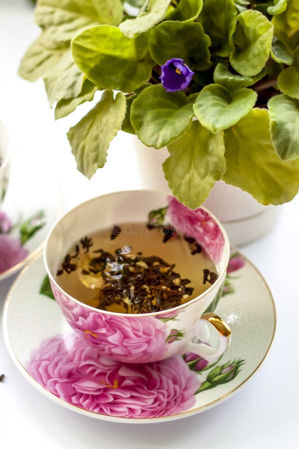 Cup of Tea. Large Tea Leaves in a Cup. a Can of Tea. Large-leaf Tea ...