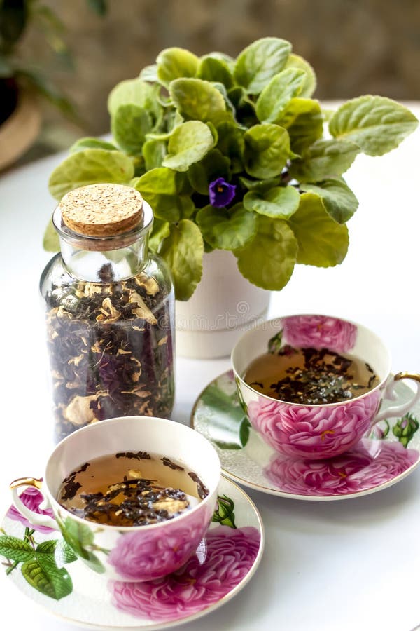 Cup of Tea. Large Tea Leaves in a Cup. a Can of Tea. Large-leaf Tea ...