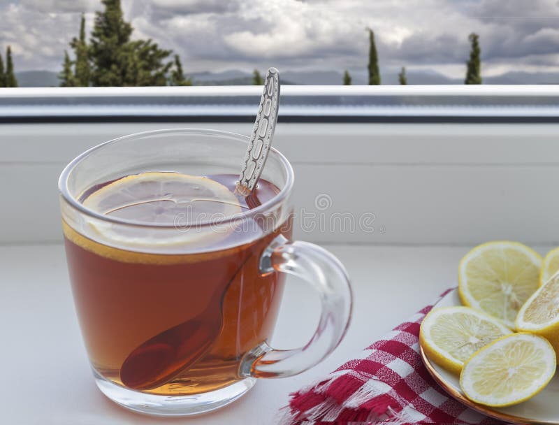 A Cup of Tea and a Lemon on the Window Sill Stock Image - Image of ...