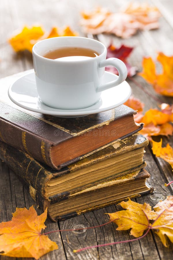 Cup of Tea with Old Book and Autumn Leaves. Stock Image - Image of ...