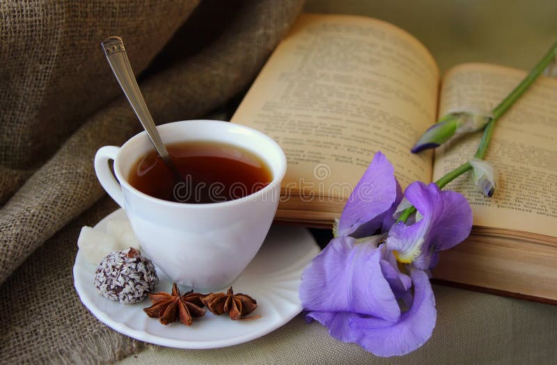 Cup of tea and open book stock image. Image of open, gourmet - 54063737