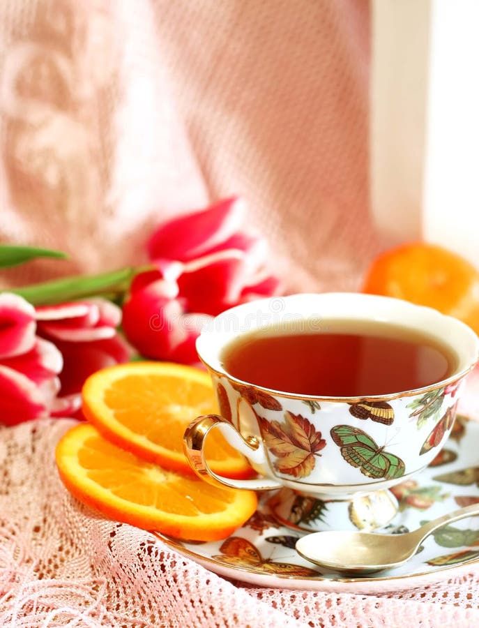 Cup of Tea, Orange and Tulips Stock Image - Image of dishware ...